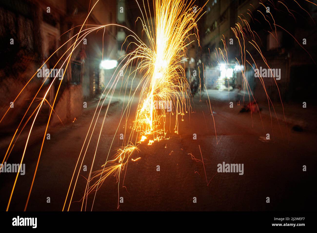 Palestinian man waves fireworks during the celebrations for the ...