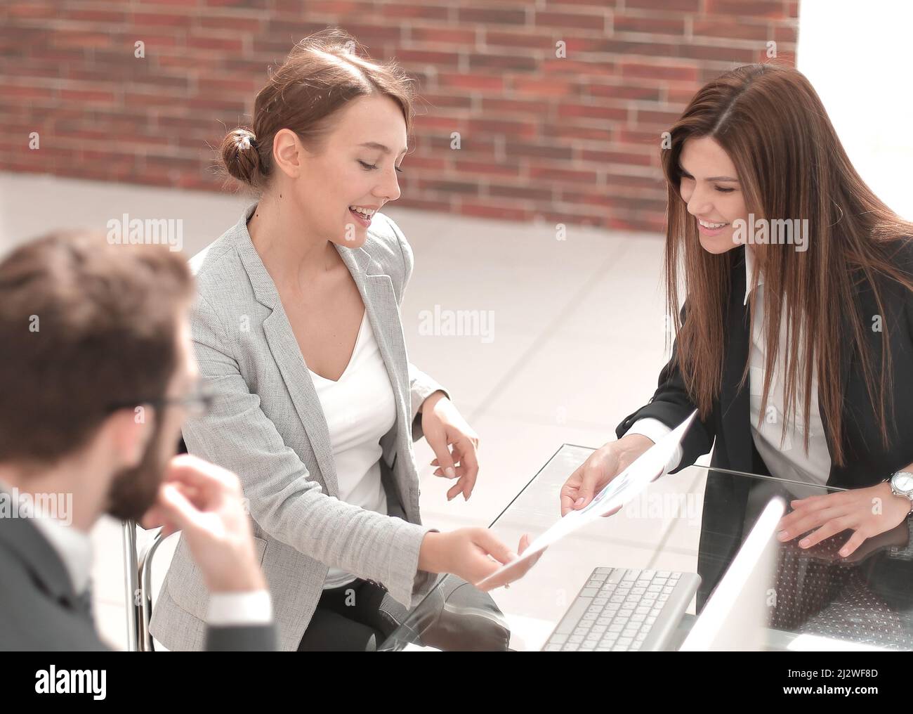 business team discusses the working documen Stock Photo - Alamy