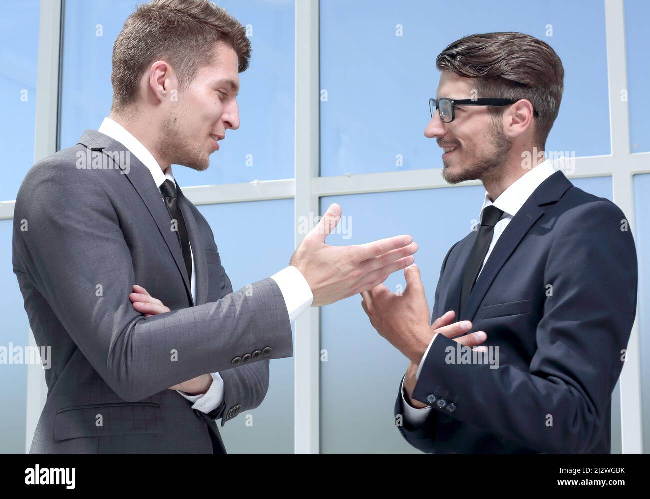 two businessmen posing Stock Photo - Alamy