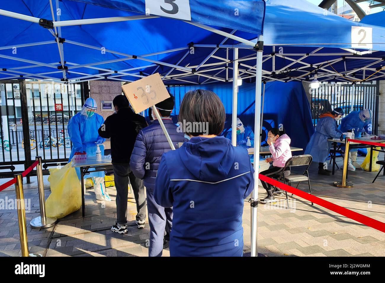 SHANGHAI, CHINA - APRIL 4, 2022 - Citizens line up for nucleic acid ...