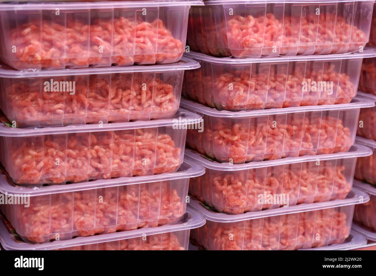 Fresh minced meat. On plastic tray with plastic wrap or gladwrap Stock ...