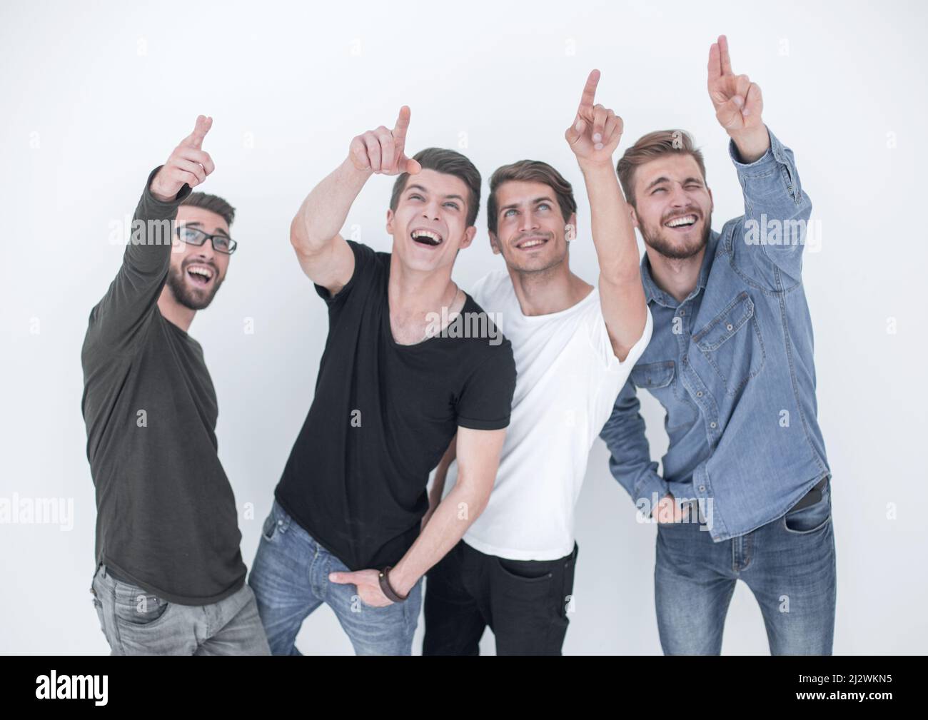 group of surprised young people looking and pointing up Stock Photo - Alamy