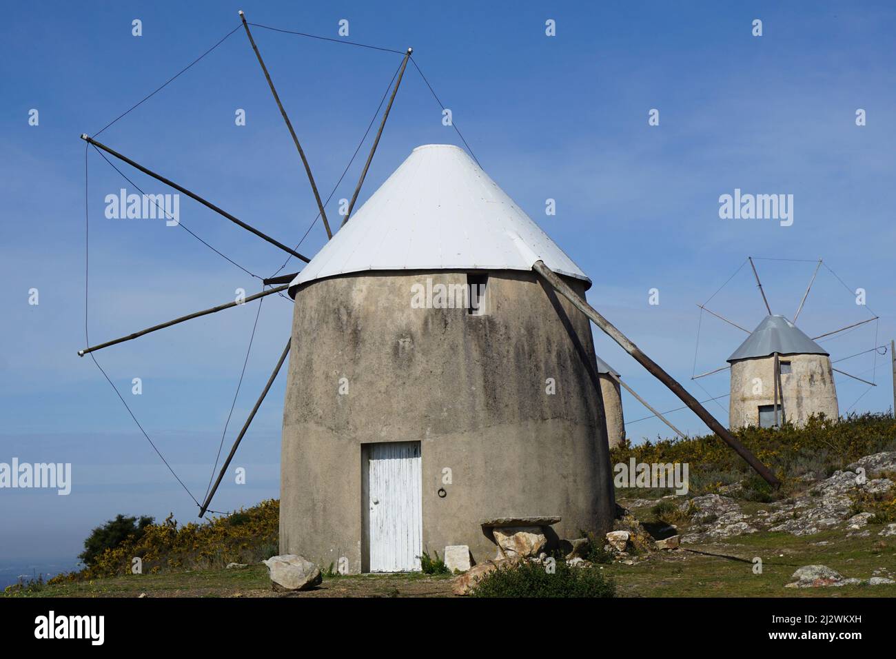 Historic ancient windmill on top of mountain Stock Photo - Alamy