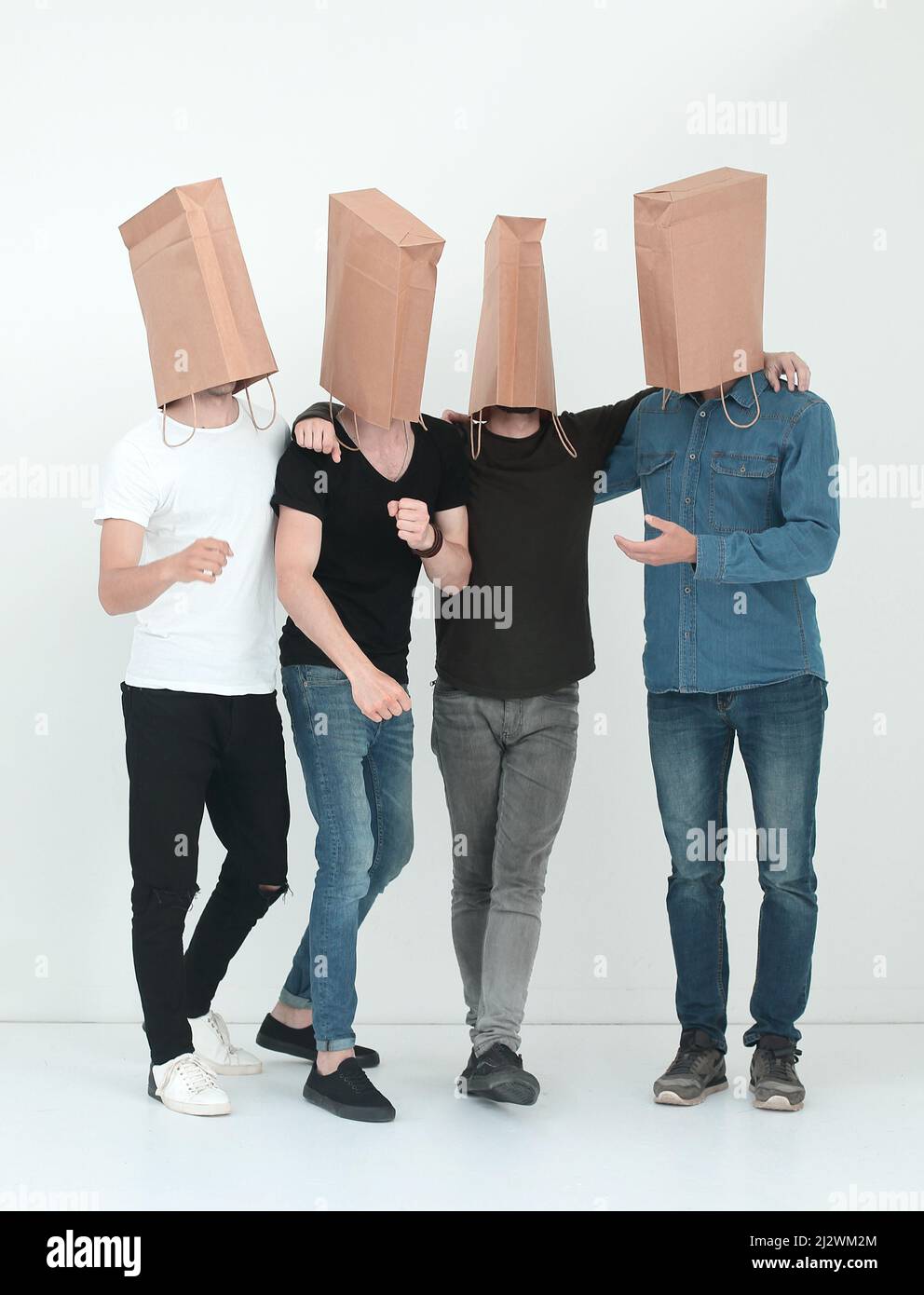 group of men with paper bags on their heads Stock Photo - Alamy