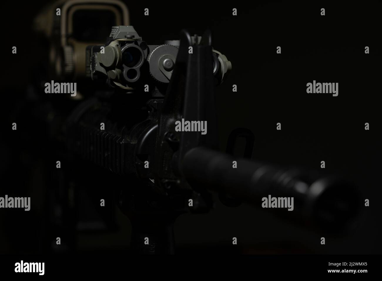 m4 rifle with optical sight and laser device on dark background Stock ...