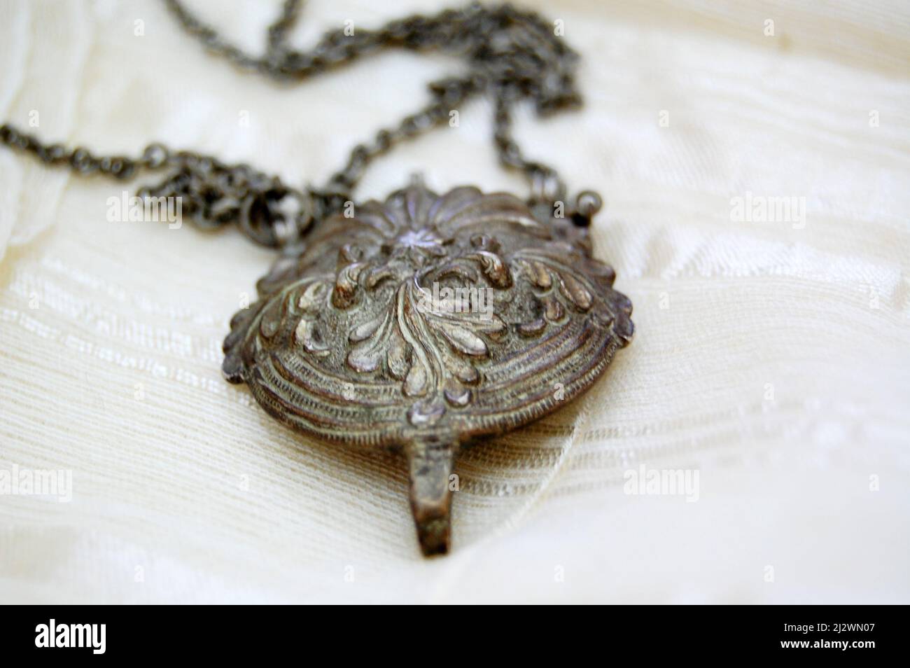 vintage pendant on necklace Stock Photo - Alamy