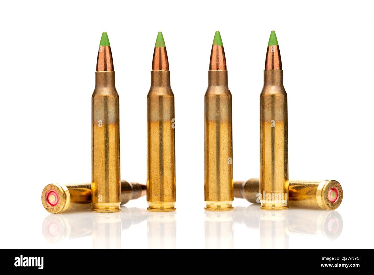 A group of 5.56 calibar, green tip bullets on white background Stock ...