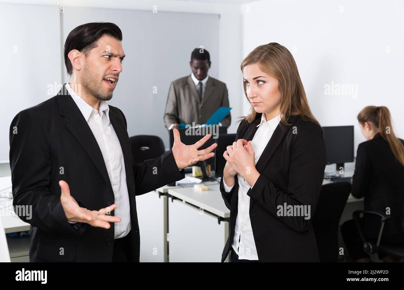 Woman office unhappy male boss hi-res stock photography and images - Alamy