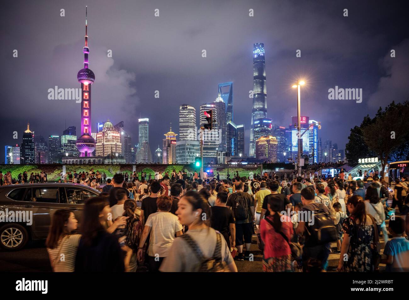 Crowds at night, The Bund, view of Pudong skyline, Shanghai, People's ...
