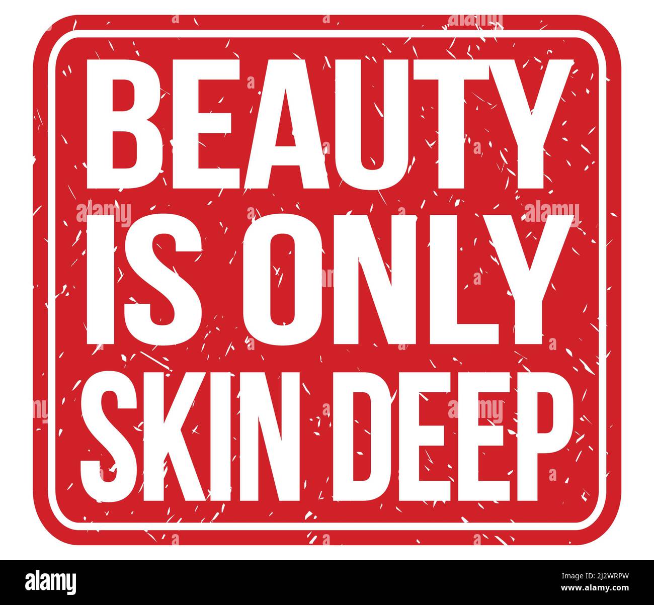 BEAUTY IS ONLY SKIN DEEP, text written on red vintage stamp sign Stock ...