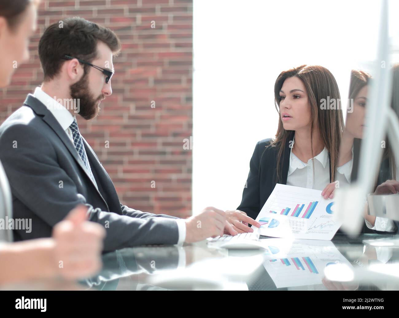 business team looks out the office window Stock Photo - Alamy