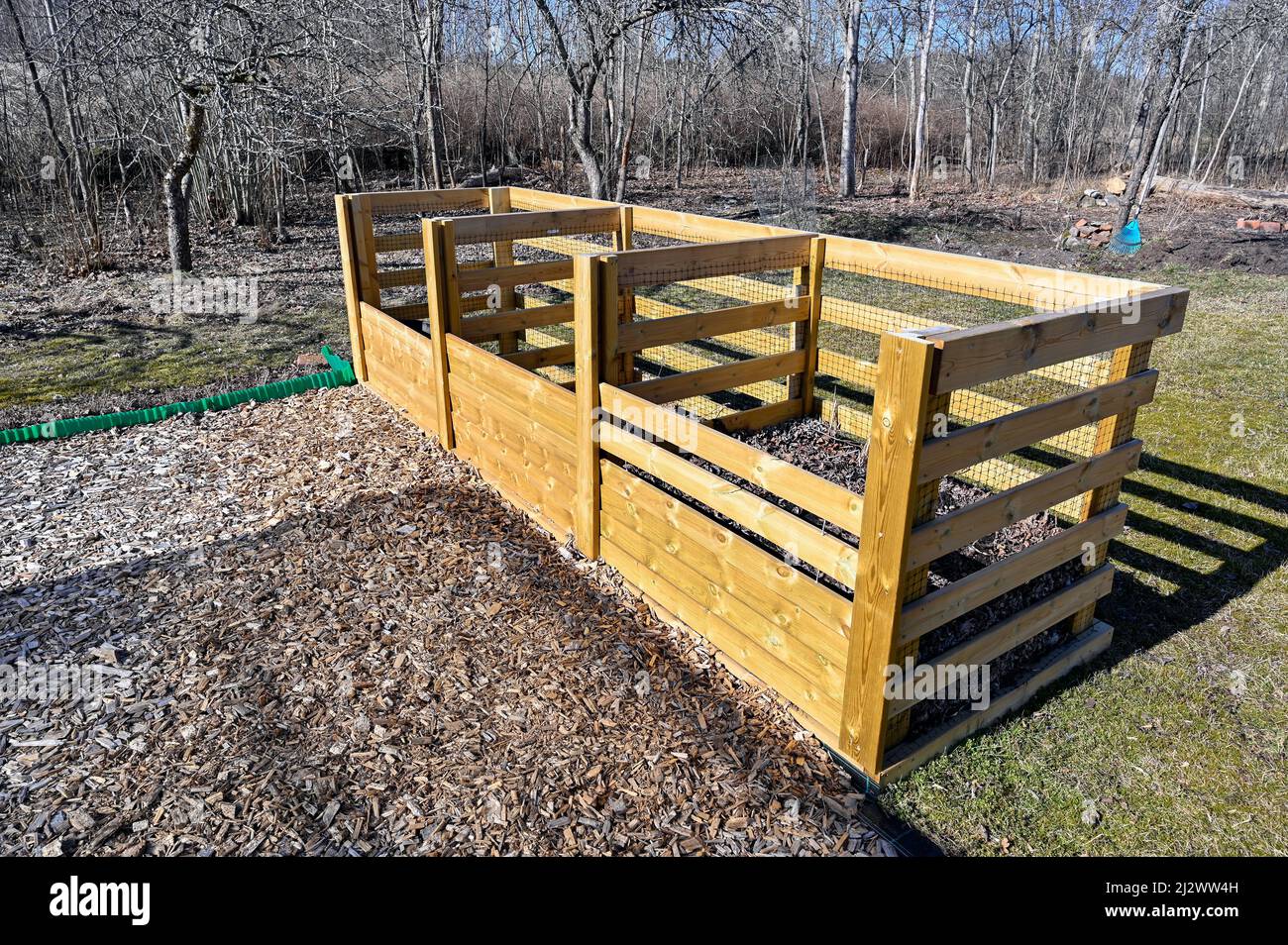 Garden compost with three compartments for different stages of compost ...