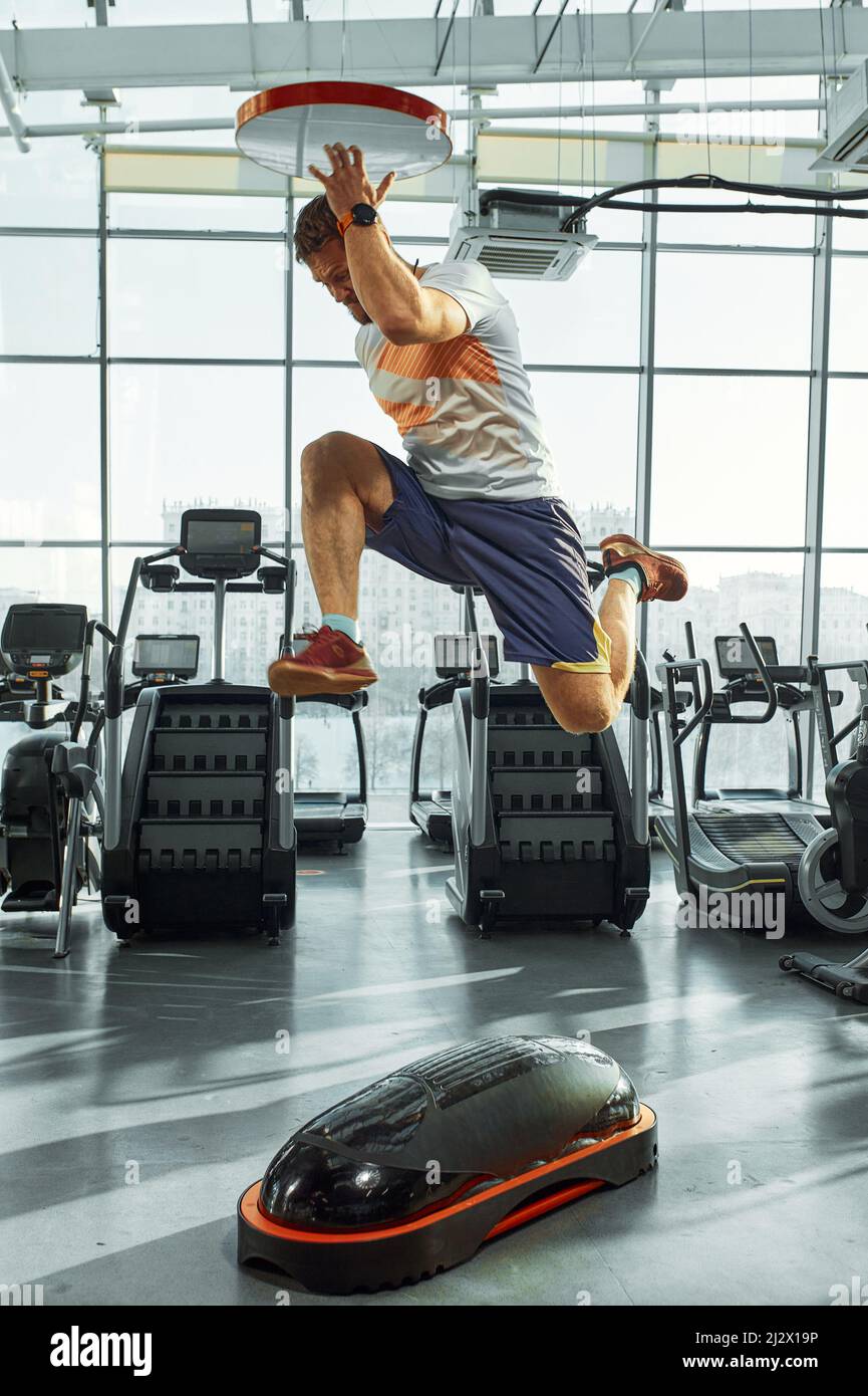Strong muscular sportsman works out hi-res stock photography and images ...