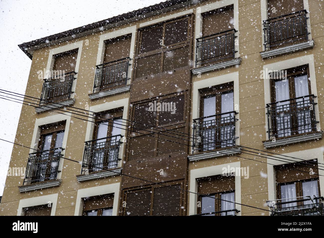 Snowy city street, stormy and cold, urban landscape Stock Photo - Alamy