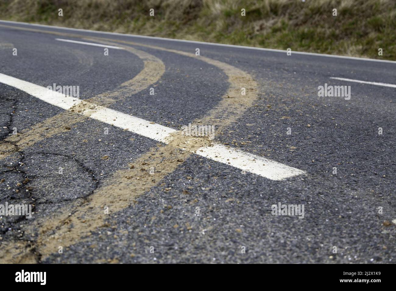 Skid texture on the road with mud, circulation and cars, danger Stock ...