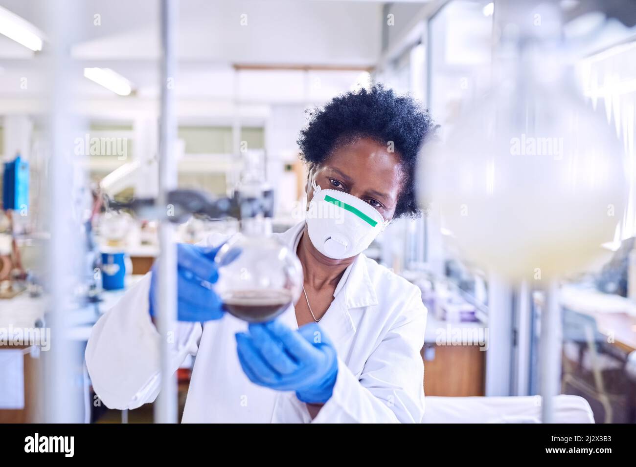 Working through the problem to uncover a solution. Shot of a female ...