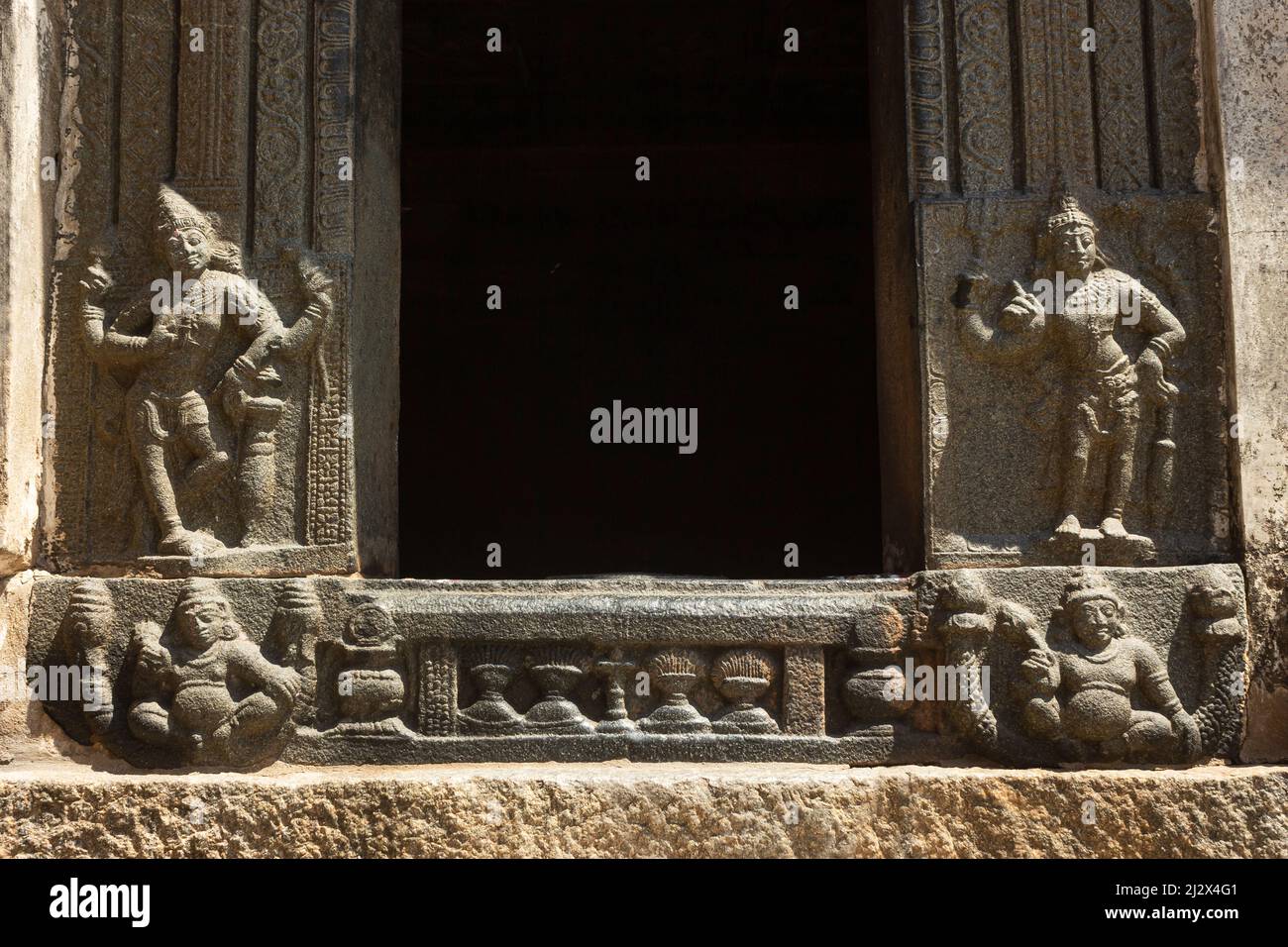 Sculpture of doorkeepers on temple shrine at Lakshmanlingeshwara Temple ...