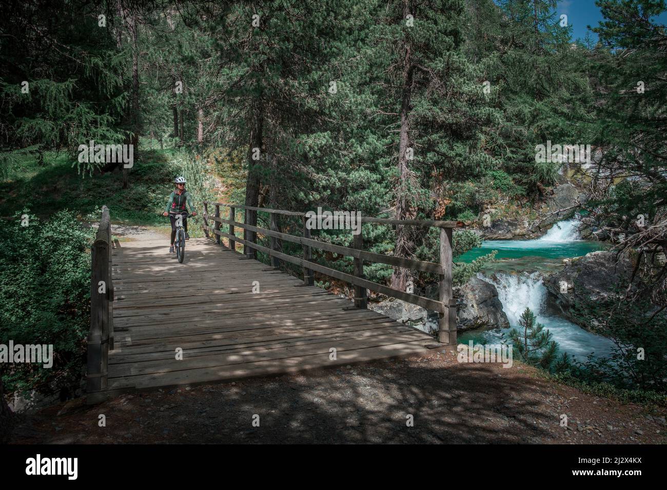 Mountain biking on the Bernina Express trail route from the Lago Bianco ...