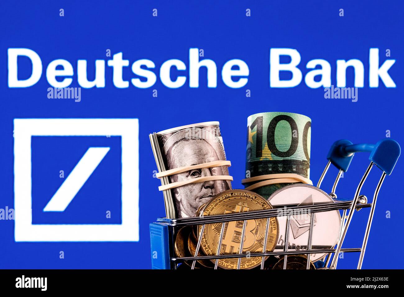 Crypto and traditional currencies in shopping cart on background of ...