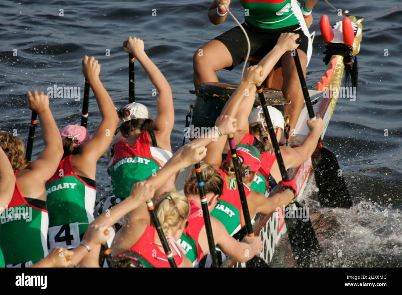 crew and drummer on a dragon boat Stock Photo - Alamy