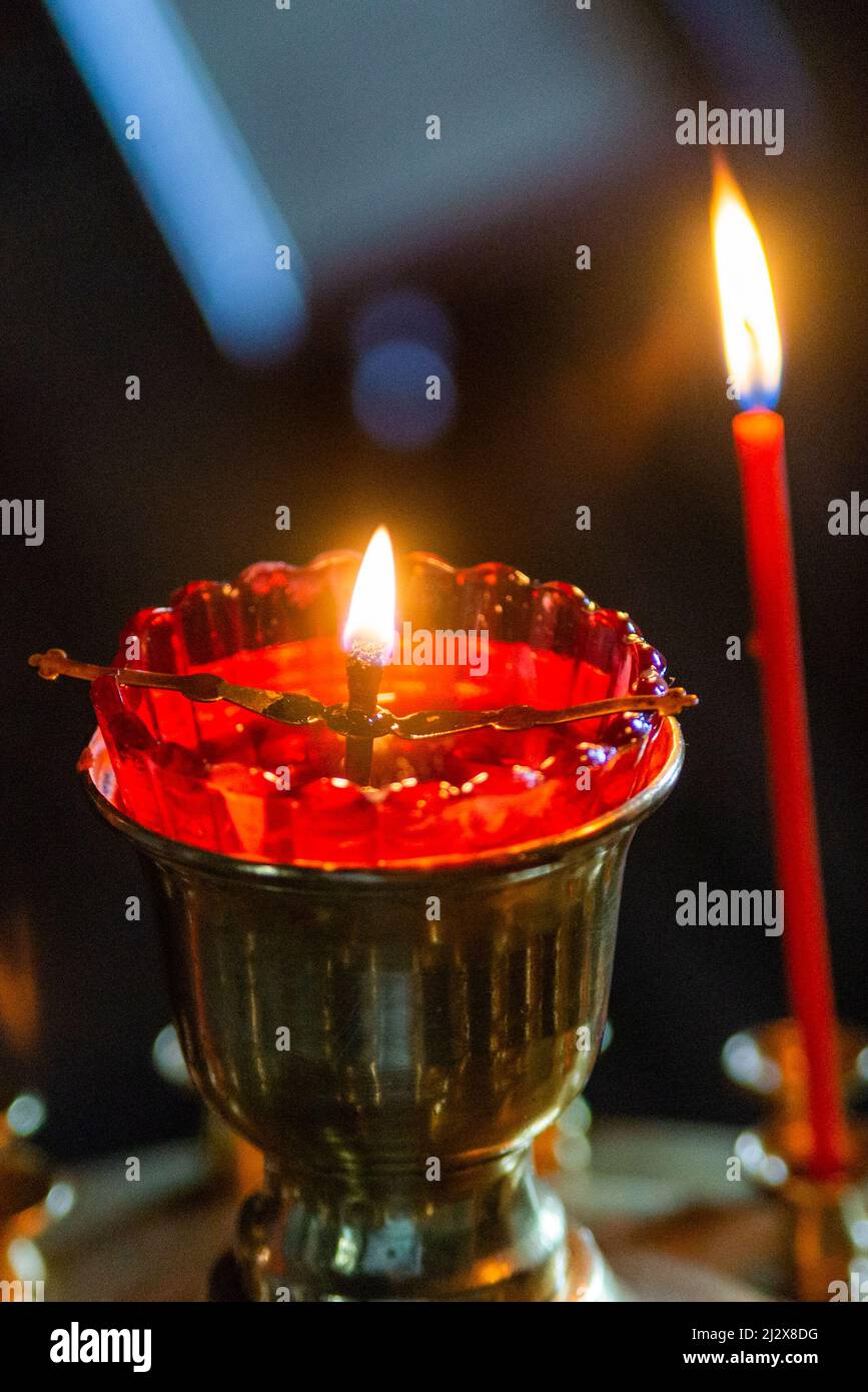 Church oil lamp in the orthodox church. Flame in the temple. Religious ...