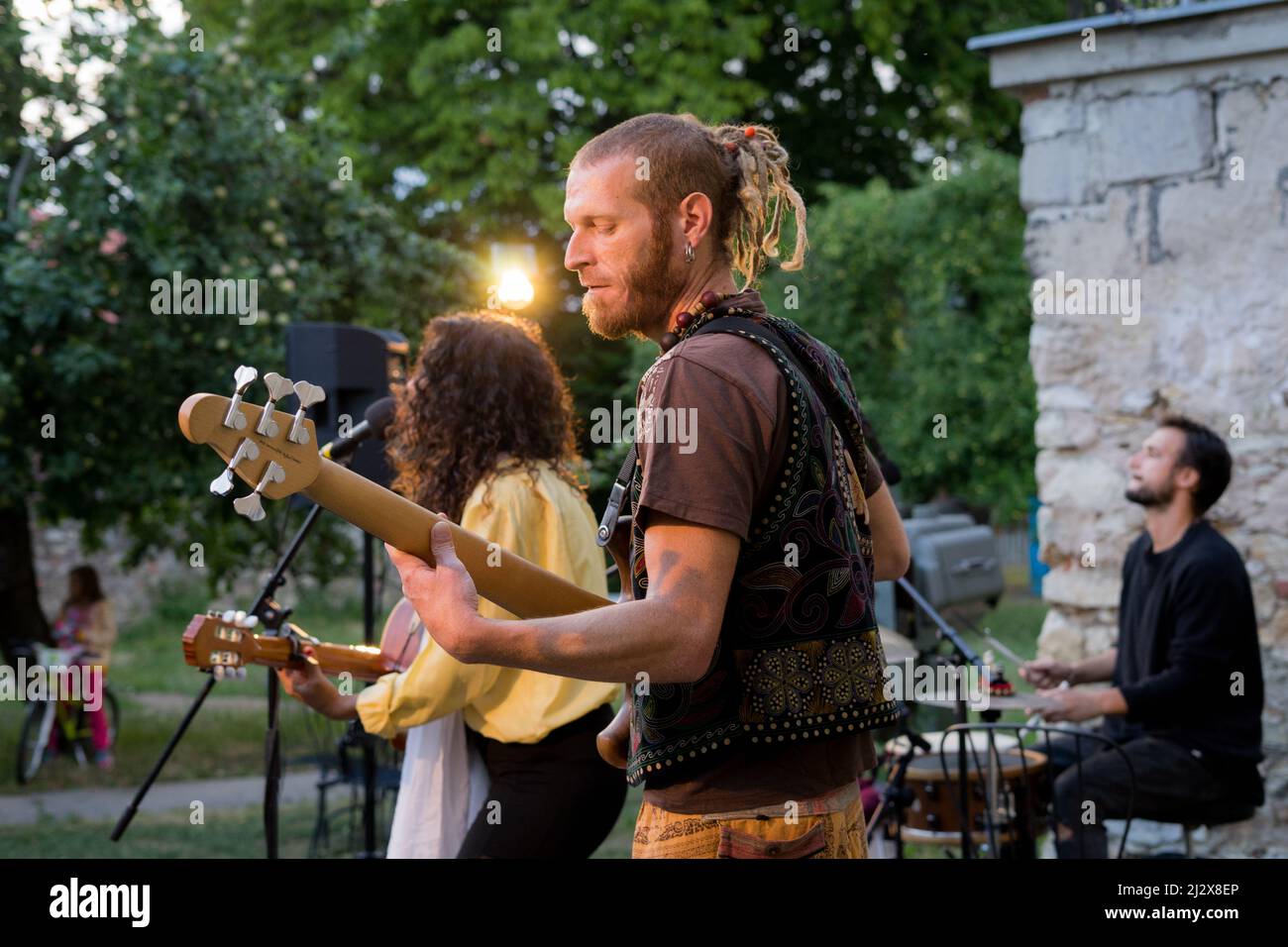 Young guitarist playing guitar in a live performance Stock Photo - Alamy