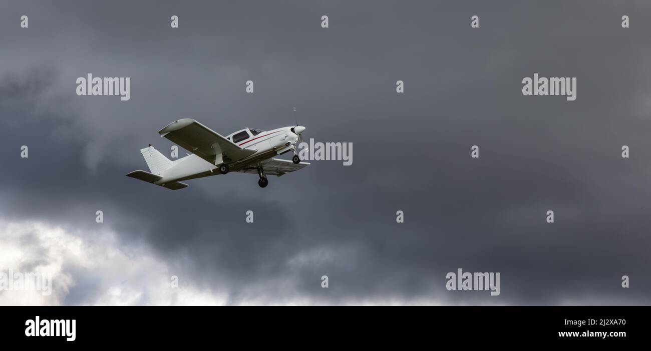 Single Engine Small Airplane taking off from an Airport Stock Photo - Alamy