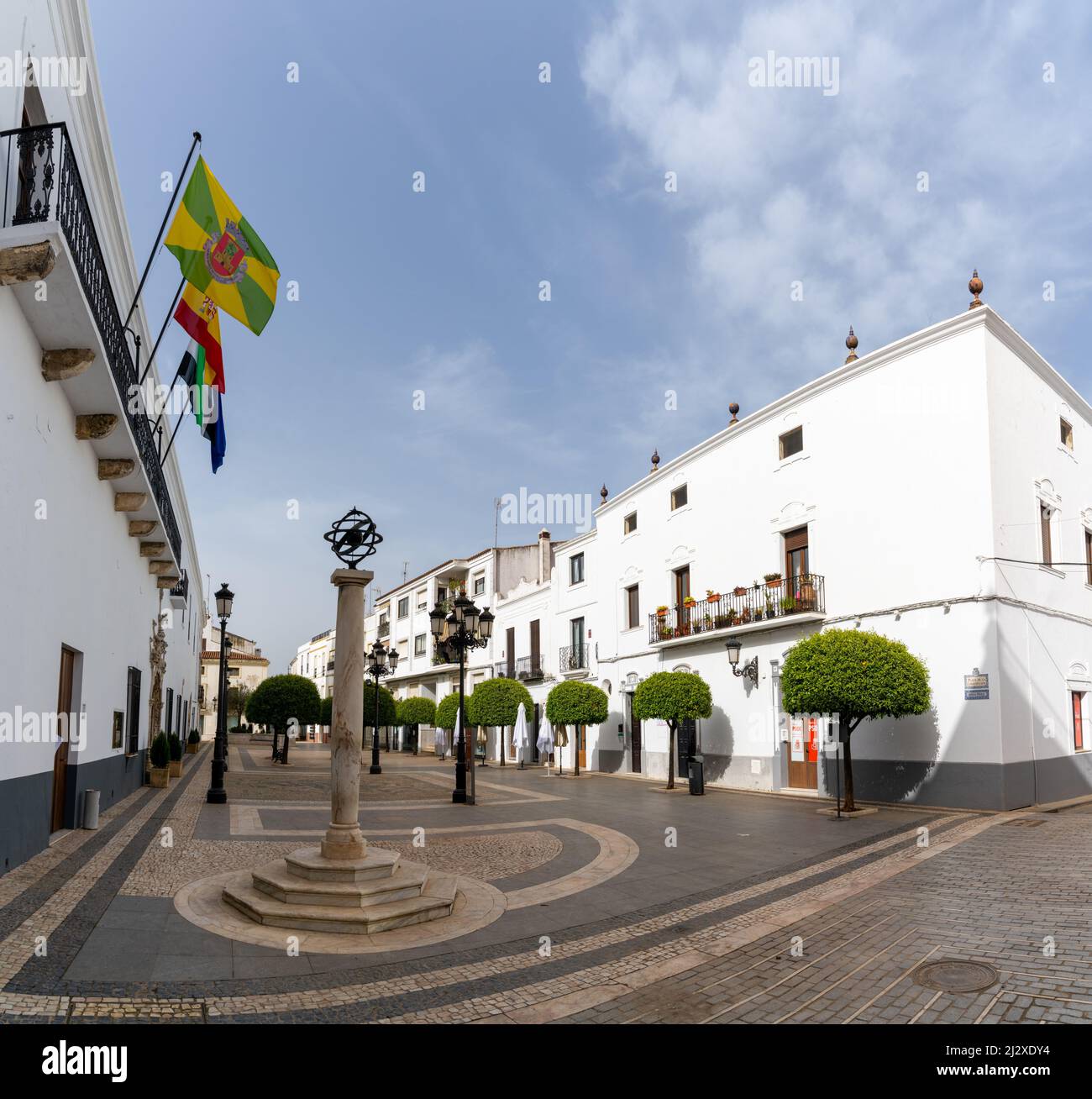 Olivenza, Spain - 27 March, 2022: orange trees and whitewashed ...