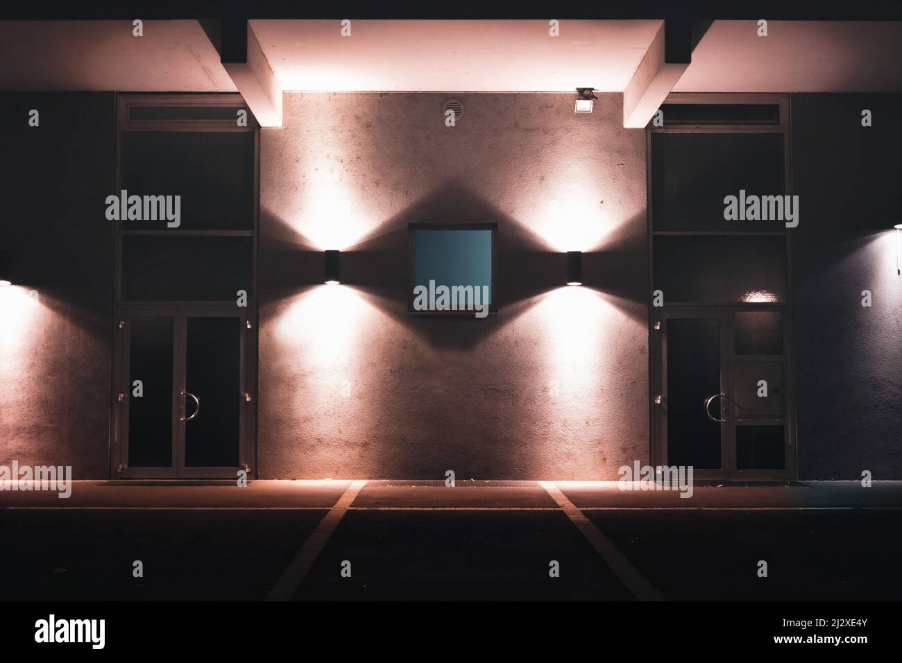 building illuminated with lights at night in a city, closeup of a ...