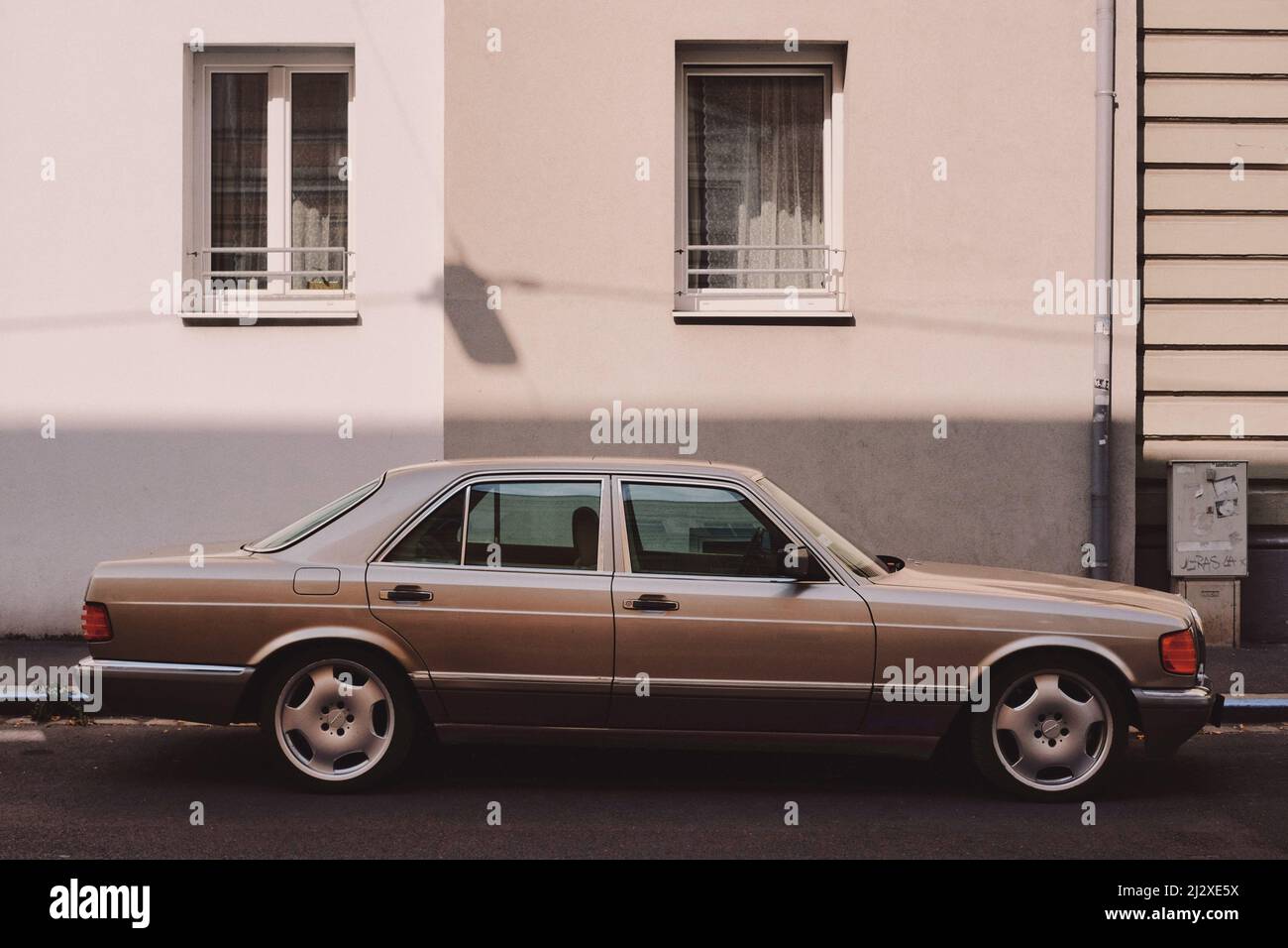 sideview of a parking car in the street, old vintage mercedes limousine ...