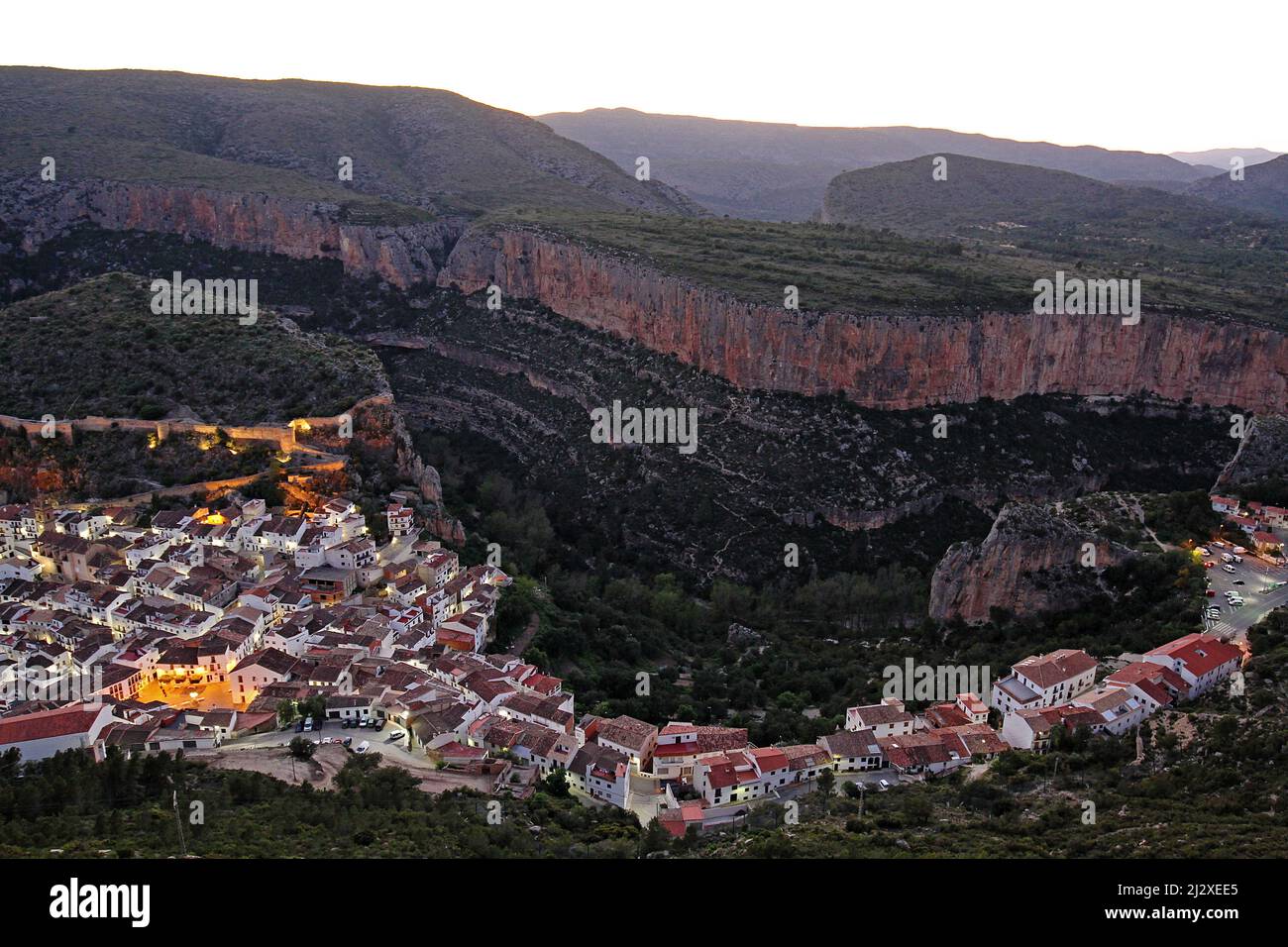 Reddish limestone walls in the climbing area Chulilla in Spain ...