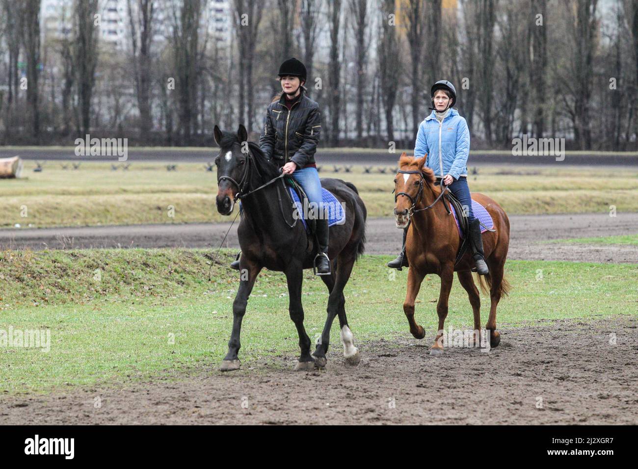 Non Exclusive: KYIV, UKRAINE - APRIL 2, 2022 - Women ride horses at the ...