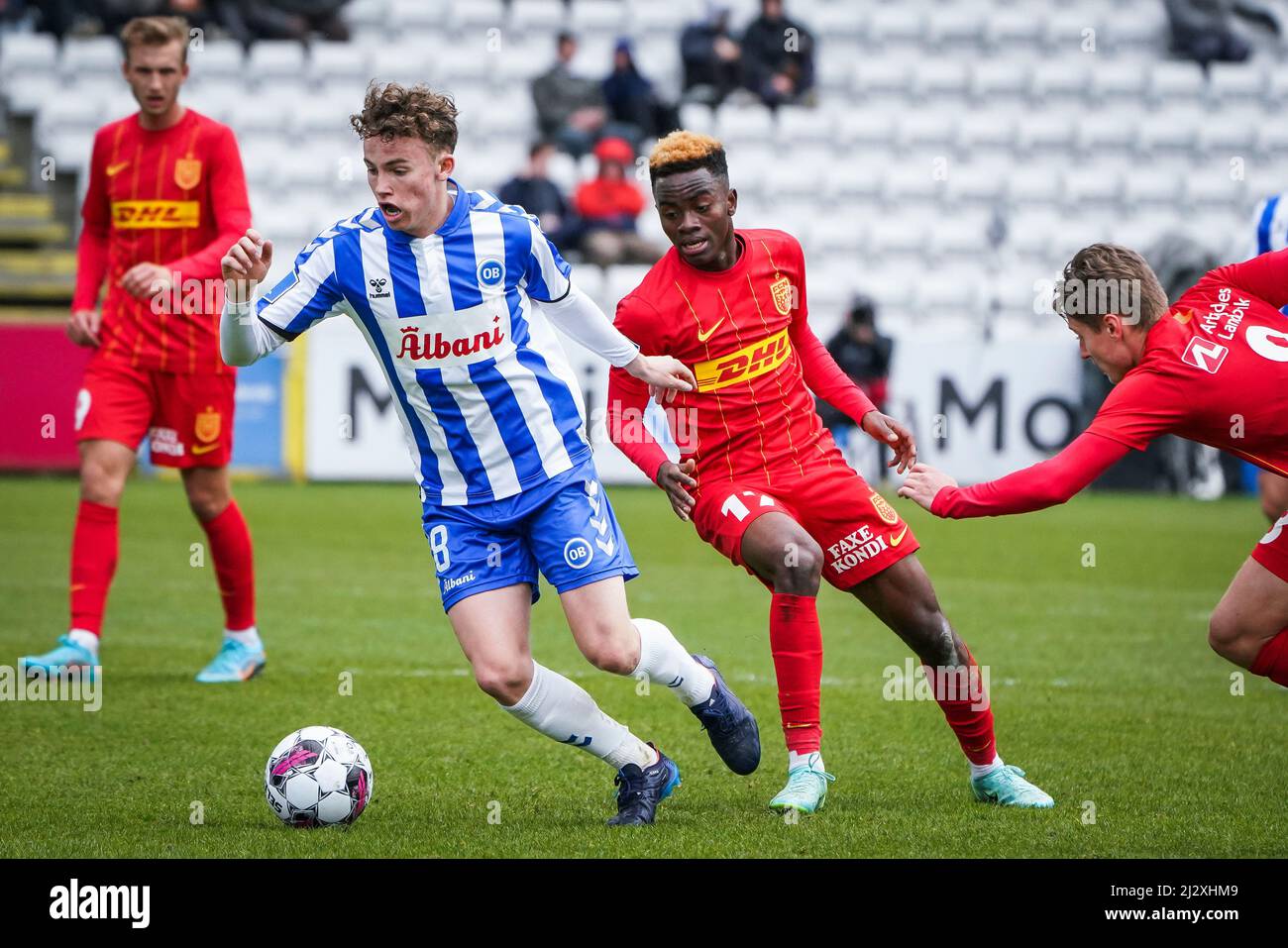 Odense, Denmark. 03rd, April 2022. Jakob Breum (8) of OB and Simon ...