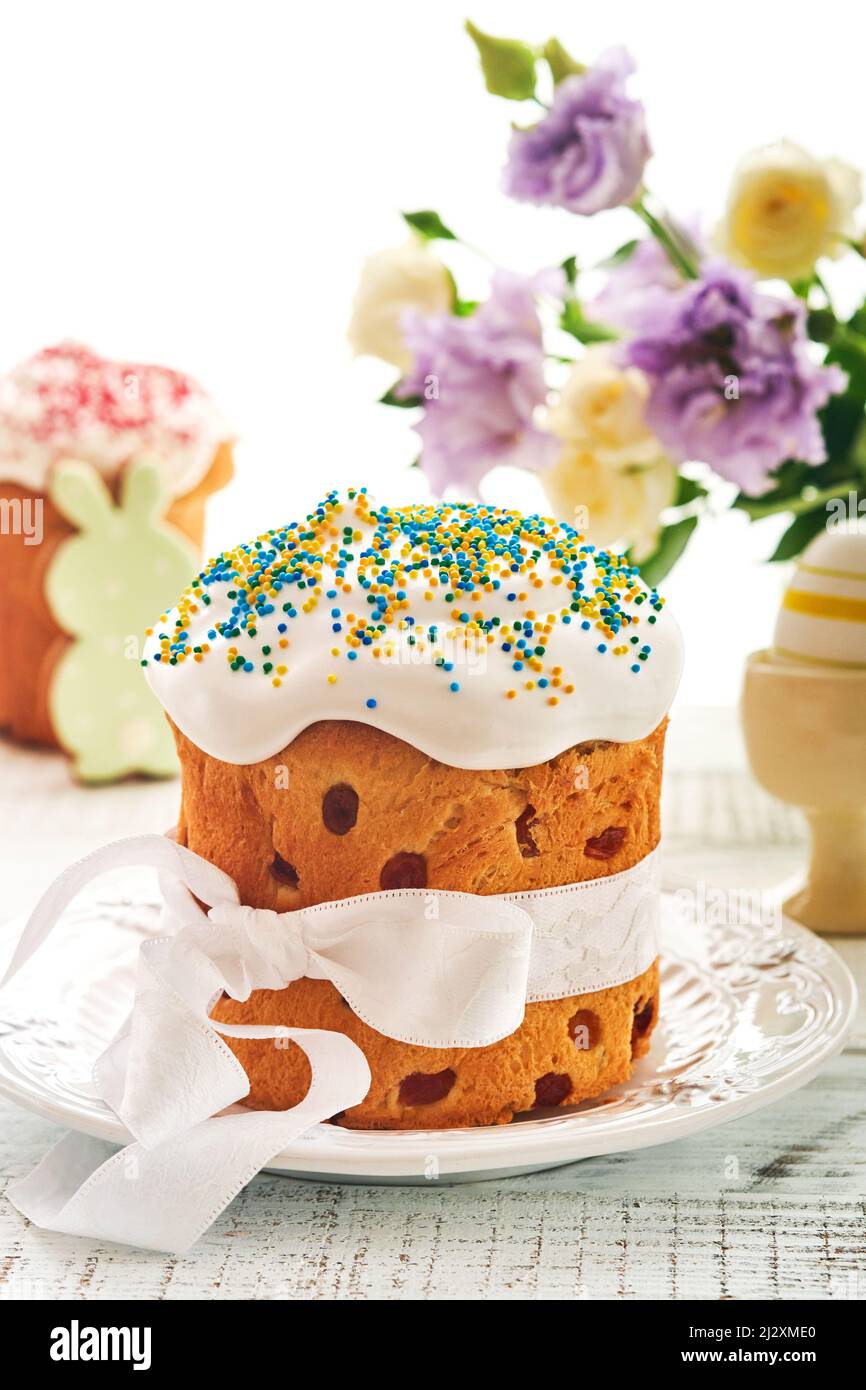 Traditional Easter sweet bread or cakes with white icing and sugar ...
