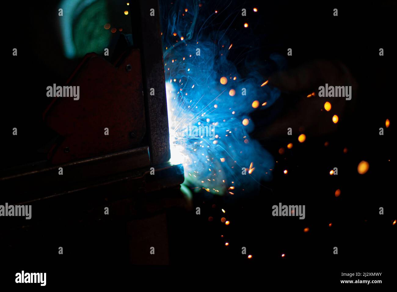 Metal welding. Fire from operation of welding machine. Manufacture of ...
