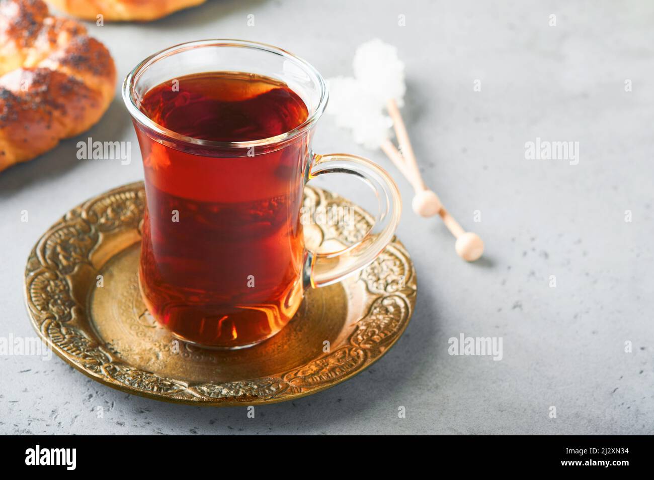 Turkish black tea. Glass cup of turkish black tea and crispy Turkish ...