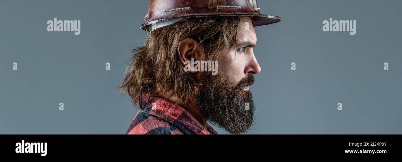 Builder in hard hat, foreman or repairman in the helmet. Building ...
