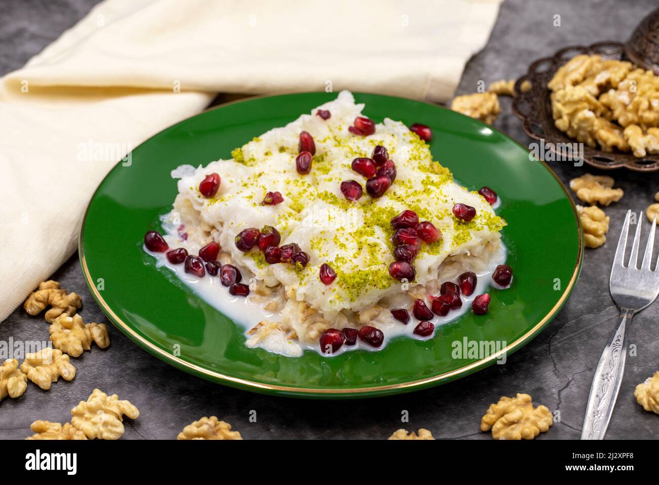 Gullac dessert ( milk dessert ) on a dark background. Traditional ...