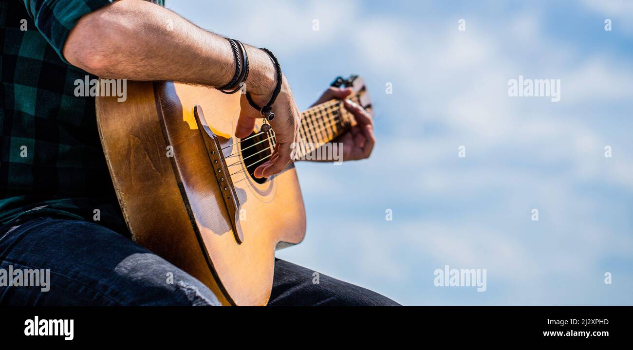 Acoustic guitars playing. Music concept. Guitars acoustic. Male ...