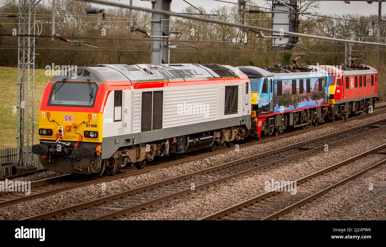 DB Schenker light loco move - 67008, 90024 and 90019 heading south past ...