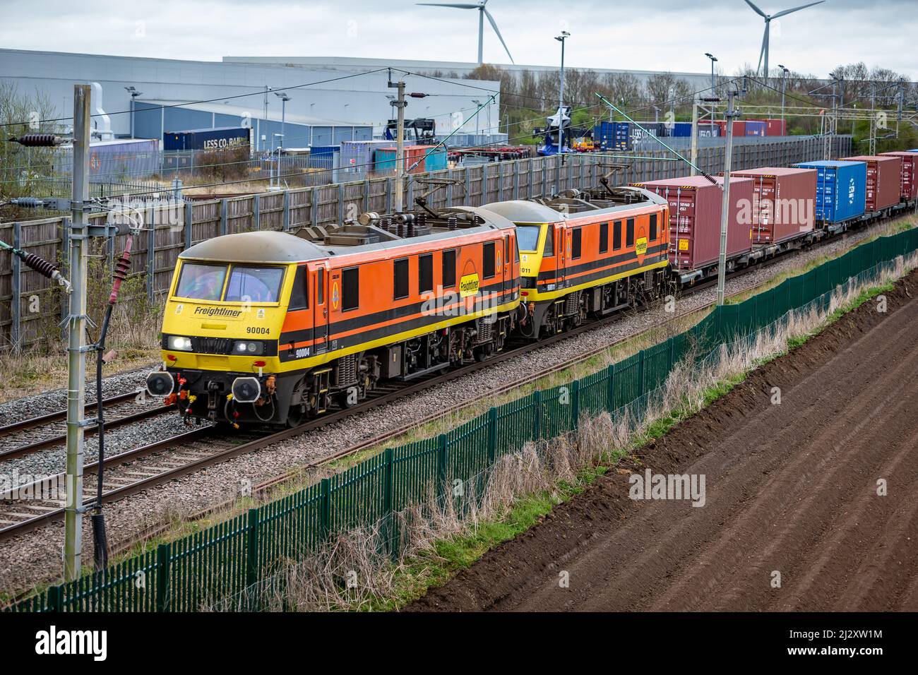 Freightliner Class 90's - 90004 and 90011 passing DIRFT Stock Photo - Alamy