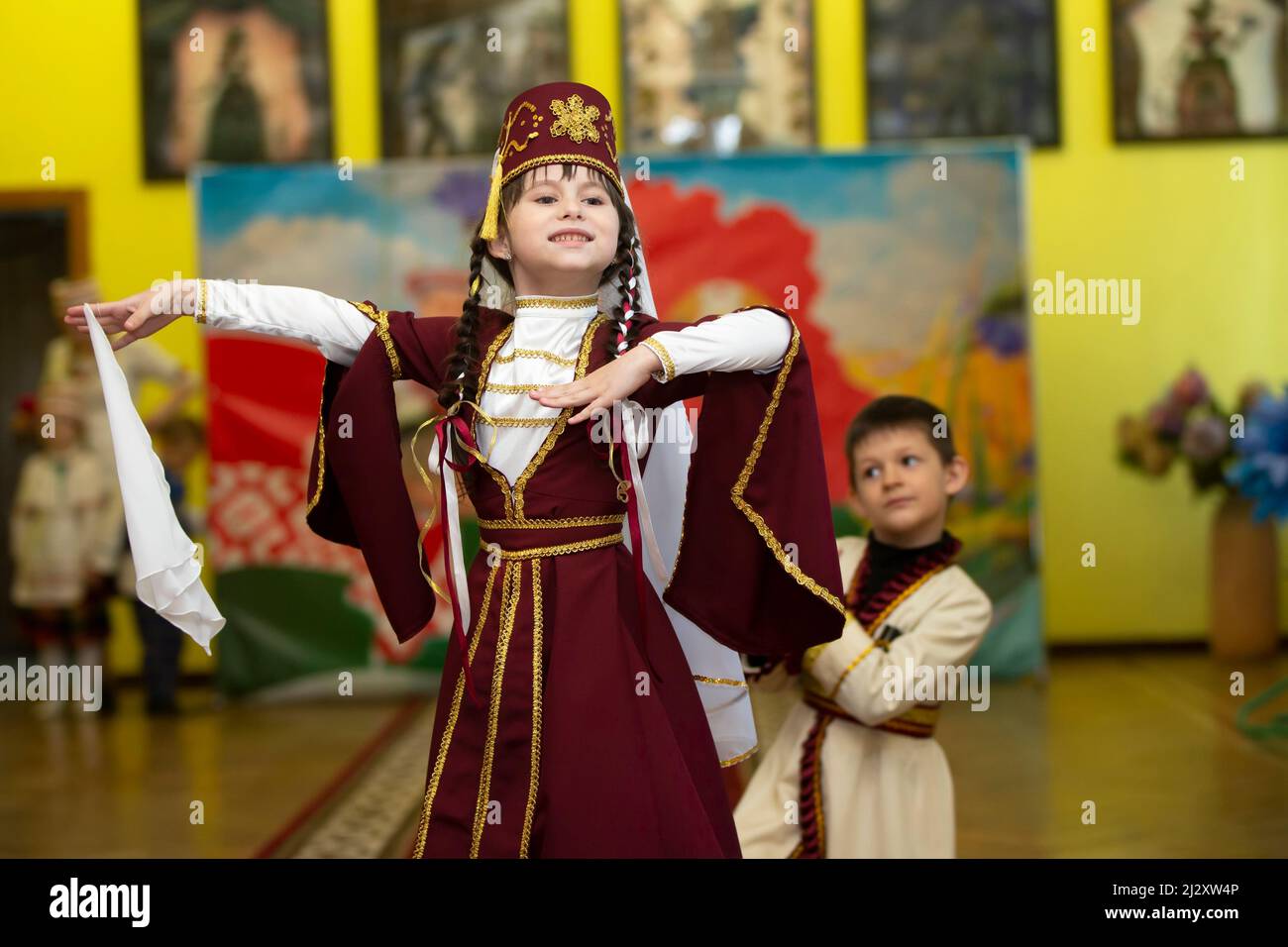 A boy and a girl in national Georgian clothes Stock Photo - Alamy