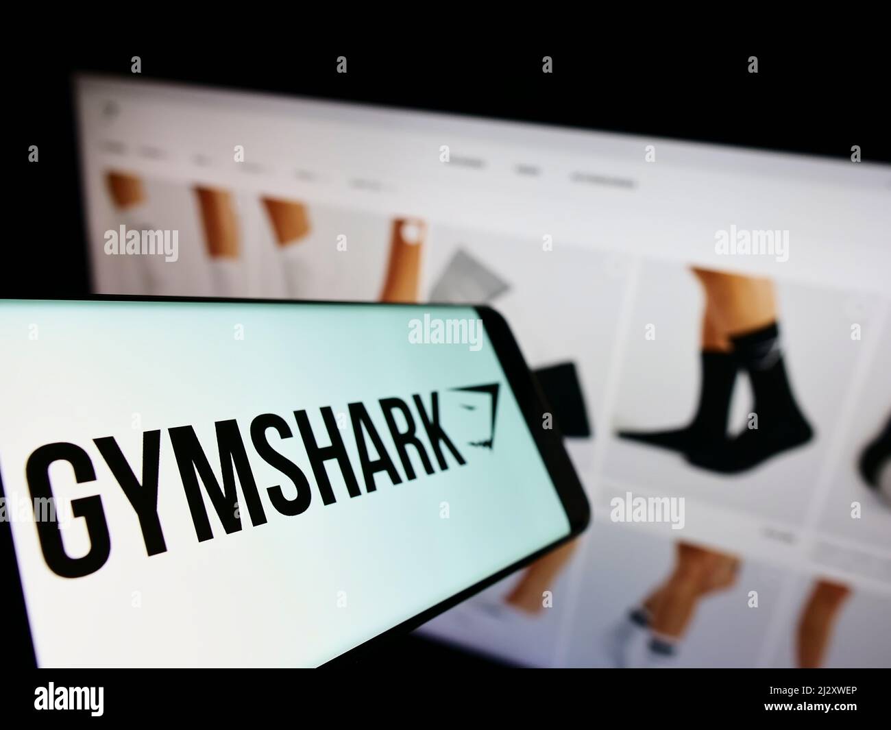 Mobile phone with website of British apparel company Gymshark Limited ...