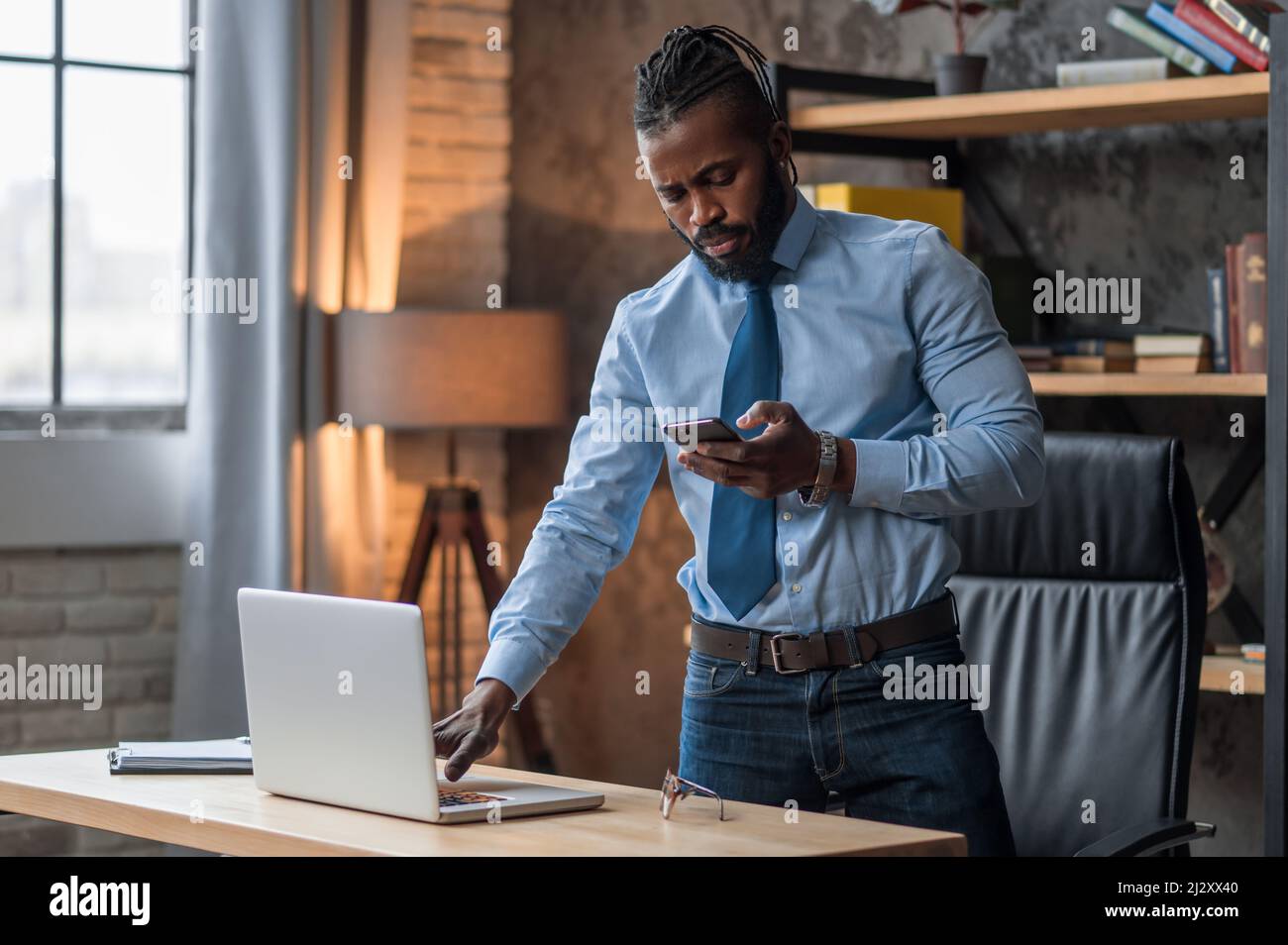 Focused millennial guy typing hi-res stock photography and images - Alamy