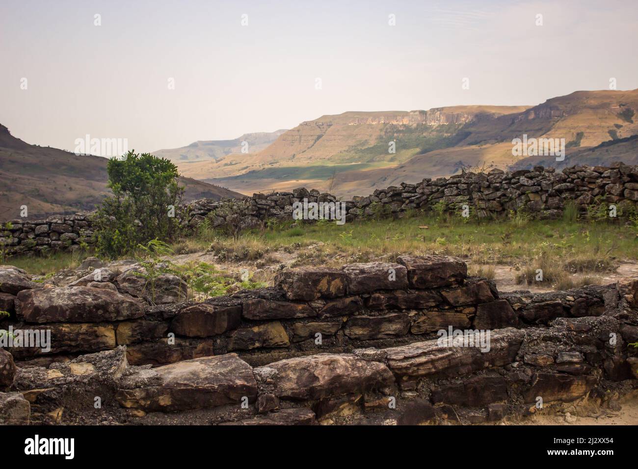The ruins of an old abandoned dip tank for cattle, with the rugged ...