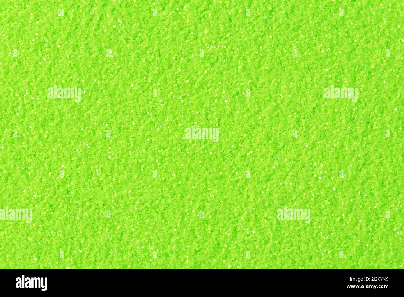 Lime glitter on macro. Great texture for design project Stock Photo - Alamy