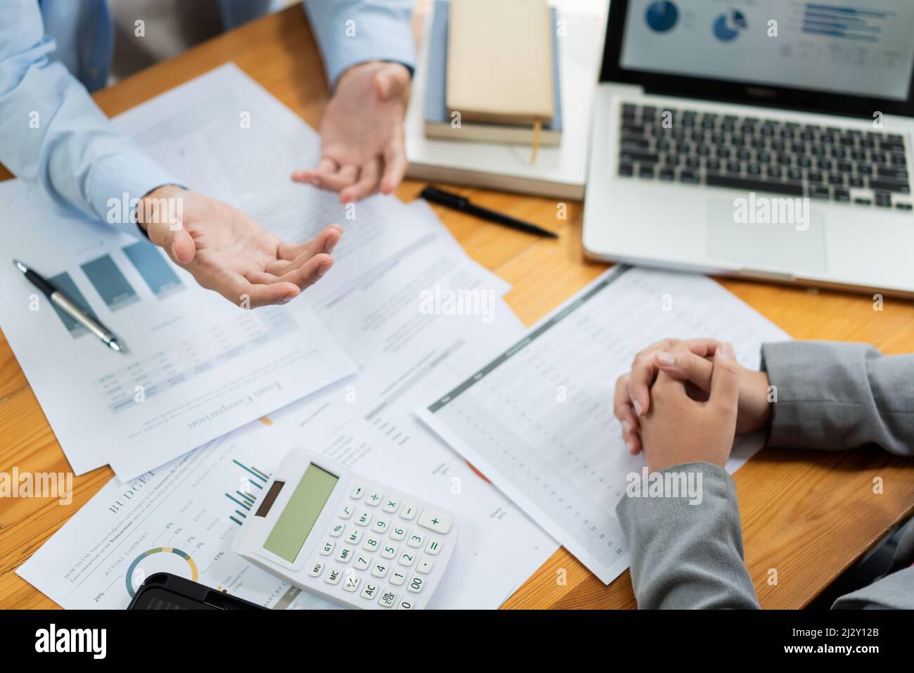 Business negotiation concept the male real estate broker negotiating ...