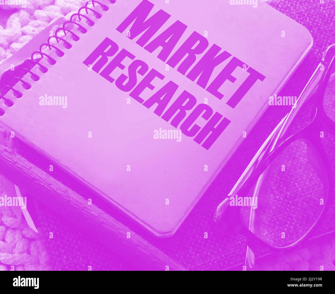 Market Reserch words written on copybook page, glasses, pen. Marketing ...