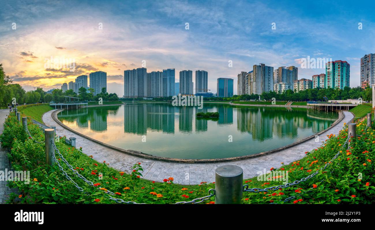 Cityscape of Hanoi skyline at Thanh Xuan park during sunset time in ...