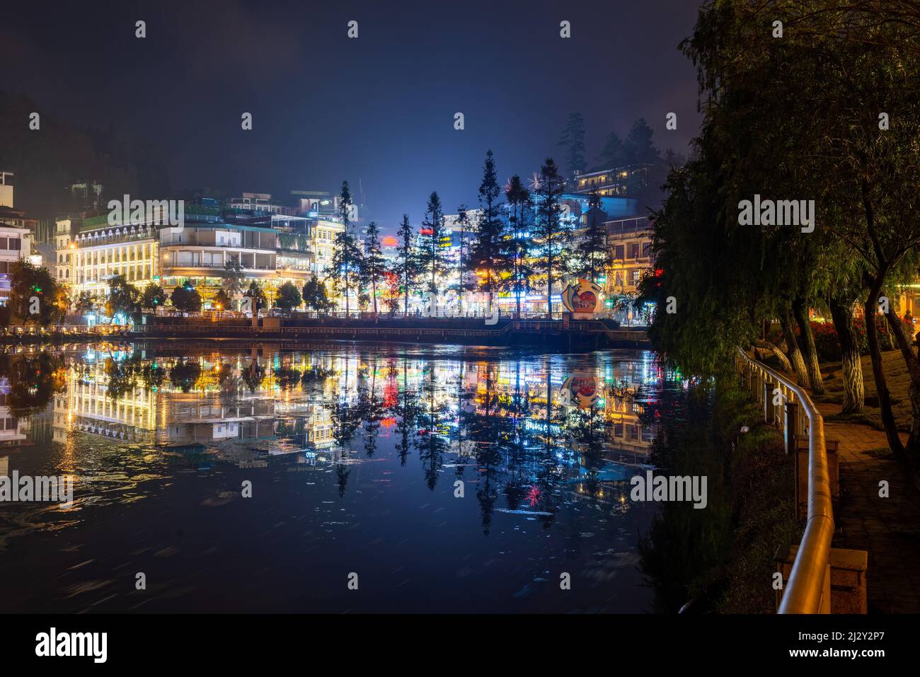 Sapa city reflects down on Sapa lake. Sa Pa is a tourist destination ...